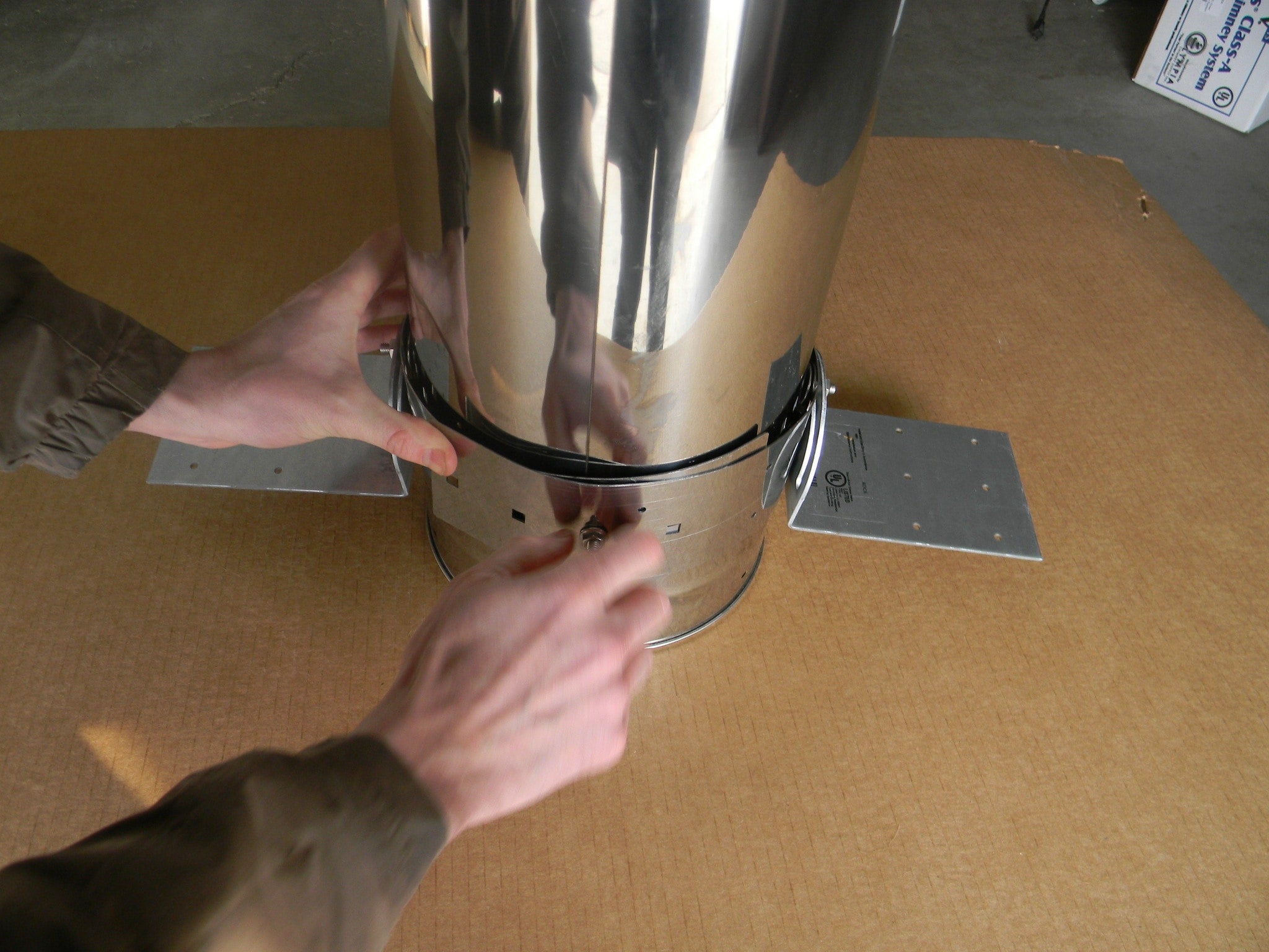 How to Install a Rock-Vent Roof Support for Chimney Pipe Installation